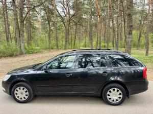 Черный Шкода Октавия 2010 в Каунас, объемом двигателя 2.00 л и пробегом 230 тыс. км за 3650 €, фото 13 на AUTOMOTO.COM.LV