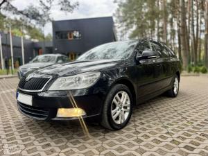 Black Skoda Octavia 2010 in Kaunas, with an engine capacity of 1.60 L and mileage of 245 thousand km for 3250 €, photo 14 on AUTOMOTO.COM.LV