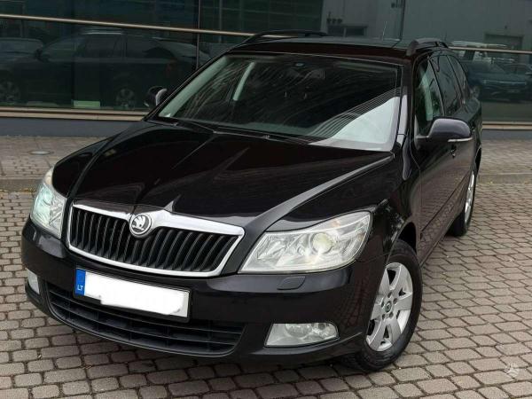 Black Skoda Octavia 2010 in Klaipeda, with an engine capacity of 1.97 L and mileage of 291 thousand km for 4250 €, photo 3 on AUTOMOTO.COM.LV