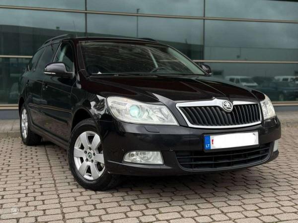 Black Skoda Octavia 2010 in Klaipeda, with an engine capacity of 1.97 L and mileage of 291 thousand km for 4250 €, photo 6 on AUTOMOTO.COM.LV