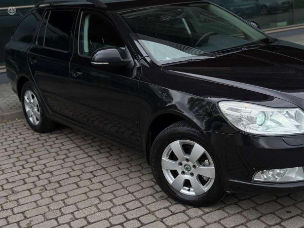 Black Skoda Octavia 2010 in Klaipeda, with an engine capacity of 1.97 L and mileage of 291 thousand km for 4250 €, photo 8 on AUTOMOTO.COM.LV