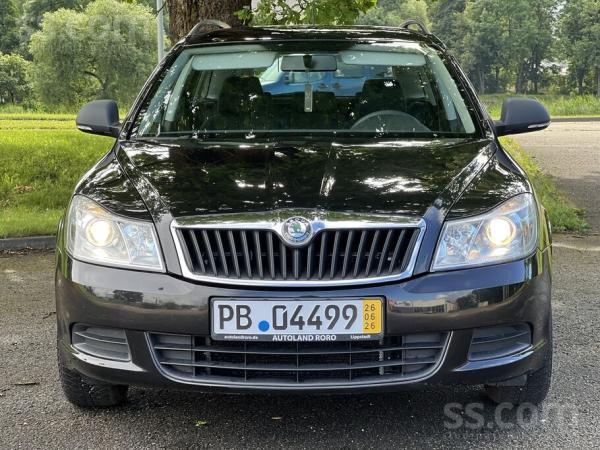 Black Skoda Octavia 2010 in Jekabpils, with an engine capacity of 1.60 L and mileage of 218 thousand km for 4990 €, photo 4 on AUTOMOTO.COM.LV
