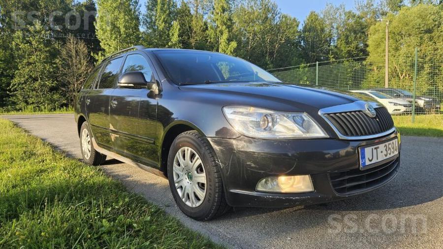 Black Skoda Octavia 2010 in Riga, with an engine capacity of 1.90 L and mileage of 357 thousand km for 1900 €, photo 5 on AUTOMOTO.COM.LV