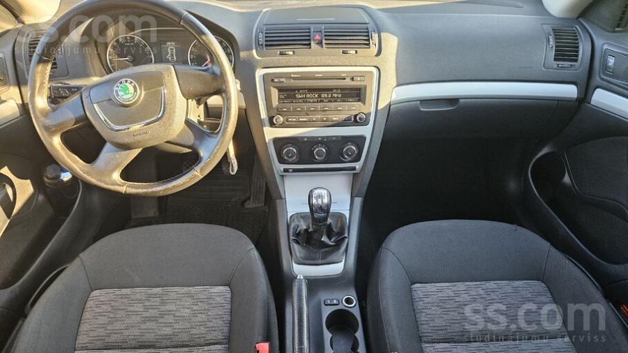Black Skoda Octavia 2010 in Riga, with an engine capacity of 1.90 L and mileage of 357 thousand km for 1900 €, photo 7 on AUTOMOTO.COM.LV