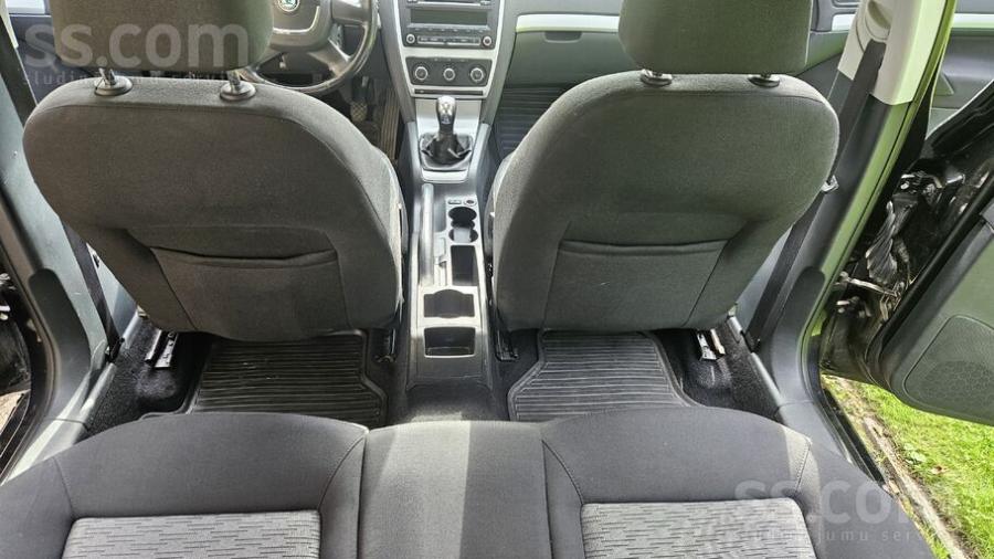 Black Skoda Octavia 2010 in Riga, with an engine capacity of 1.90 L and mileage of 357 thousand km for 1900 €, photo 12 on AUTOMOTO.COM.LV
