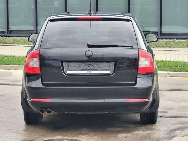 Black Skoda Octavia 2010 in Siauliai, with an engine capacity of 1.97 L and mileage of 288 thousand km for 3700 €, photo 7 on AUTOMOTO.COM.LV