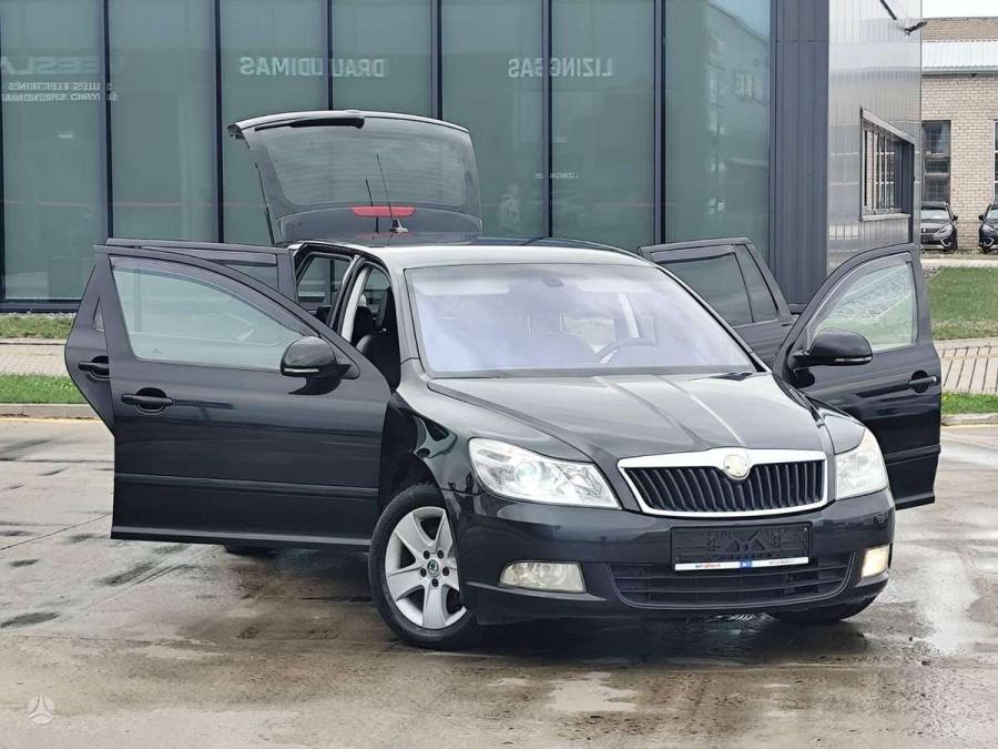Melns Skoda Octavia 2010 Šauļi, ar dzinēja tilpumu 1.97 L un nobraukumu 288 tūkst. km par 3700 €, foto 15 vietnē AUTOMOTO.COM.LV