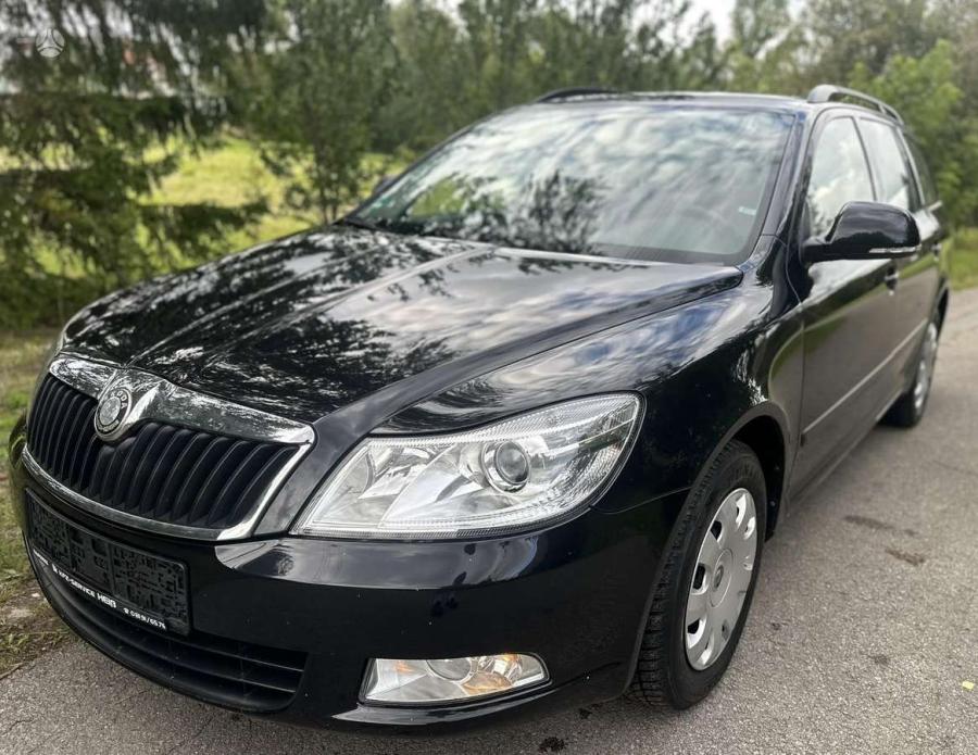Melns Skoda Octavia 2010 Marijampole, ar dzinēja tilpumu 1.80 L un nobraukumu 210 tūkst. km par 2800 €, foto 3 vietnē AUTOMOTO.COM.LV