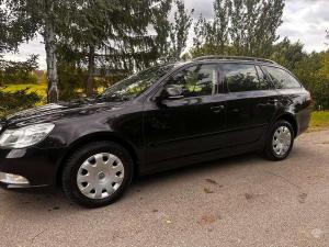Melns Skoda Octavia 2010 Marijampole, ar dzinēja tilpumu 1.80 L un nobraukumu 210 tūkst. km par 2800 €, foto 4 vietnē AUTOMOTO.COM.LV