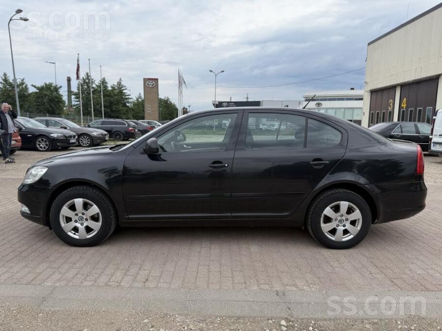 Black Skoda Octavia 2011 in Liepaja, with an engine capacity of 1.40 L and mileage of 269 thousand km for 2600 €, photo 5 on AUTOMOTO.COM.LV