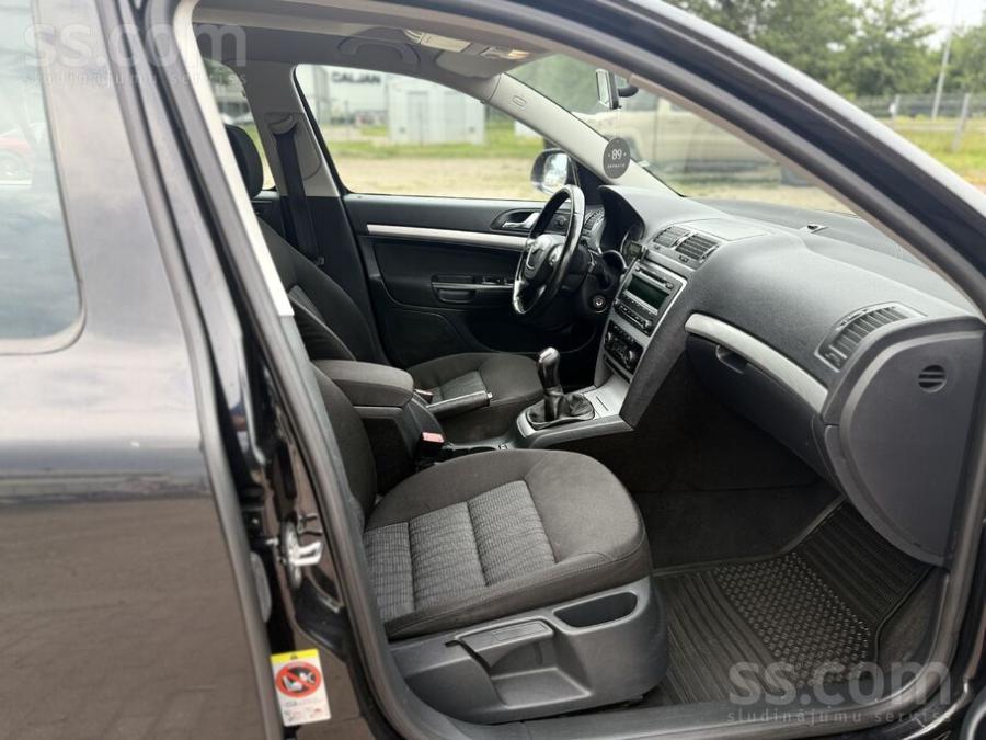 Black Skoda Octavia 2011 in Liepaja, with an engine capacity of 1.40 L and mileage of 269 thousand km for 2600 €, photo 12 on AUTOMOTO.COM.LV