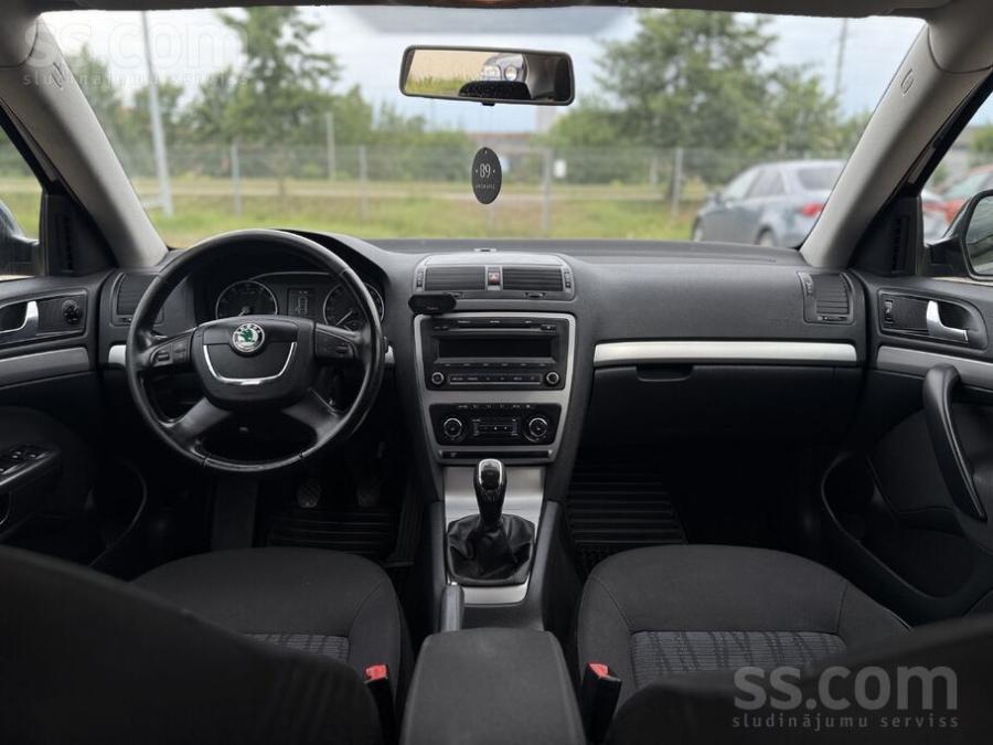 Black Skoda Octavia 2011 in Liepaja, with an engine capacity of 1.40 L and mileage of 269 thousand km for 2600 €, photo 14 on AUTOMOTO.COM.LV