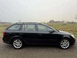 Black Skoda Octavia 2011 in Raseiniai, with an engine capacity of 1.97 L and mileage of 260 thousand km for 3350 €, photo 3 on AUTOMOTO.COM.LV