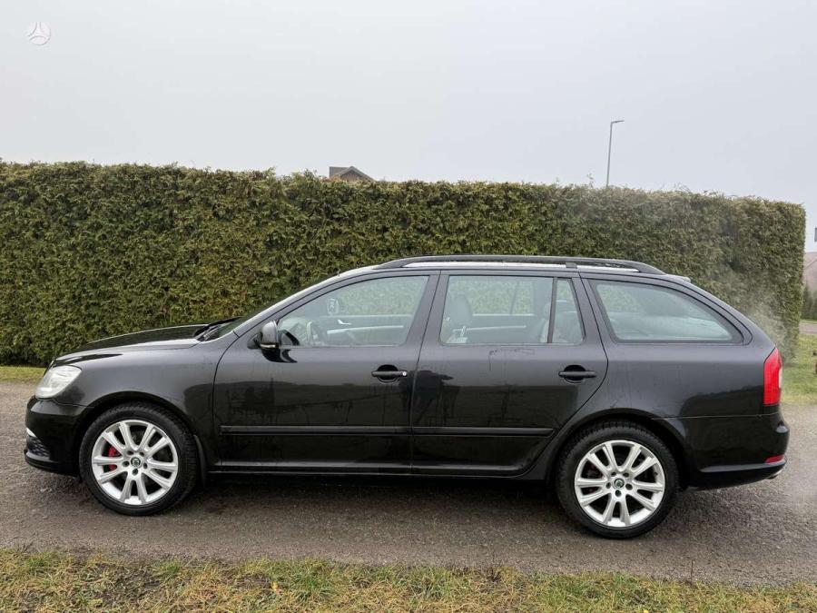 Black Skoda Octavia 2011 in Raseiniai, with an engine capacity of 1.97 L and mileage of 260 thousand km for 3350 €, photo 4 on AUTOMOTO.COM.LV