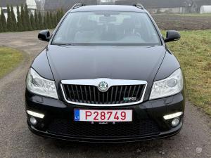 Black Skoda Octavia 2011 in Raseiniai, with an engine capacity of 1.97 L and mileage of 260 thousand km for 3350 €, photo 5 on AUTOMOTO.COM.LV