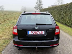 Black Skoda Octavia 2011 in Raseiniai, with an engine capacity of 1.97 L and mileage of 260 thousand km for 3350 €, photo 6 on AUTOMOTO.COM.LV