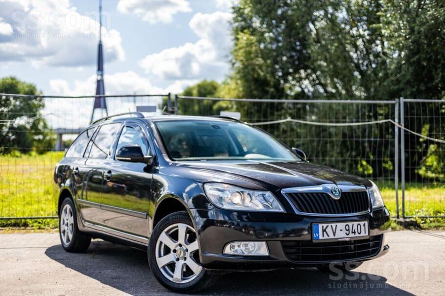 Black Skoda Octavia 2011 in Riga, with an engine capacity of 2.00 L and mileage of 385 thousand km for 2990 €, photo 2 on AUTOMOTO.COM.LV