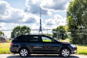 Black Skoda Octavia 2011 in Riga, with an engine capacity of 2.00 L and mileage of 385 thousand km for 2990 €, photo 5 on AUTOMOTO.COM.LV