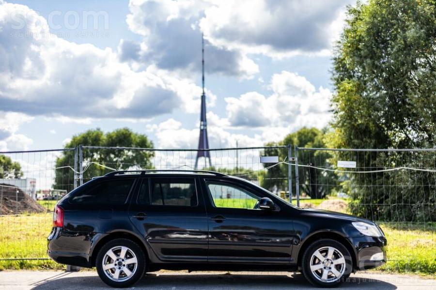 Black Skoda Octavia 2011 in Riga, with an engine capacity of 2.00 L and mileage of 385 thousand km for 2990 €, photo 5 on AUTOMOTO.COM.LV