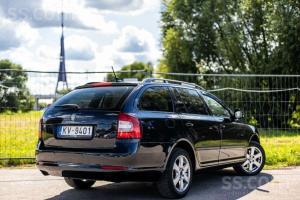 Black Skoda Octavia 2011 in Riga, with an engine capacity of 2.00 L and mileage of 385 thousand km for 2990 €, photo 6 on AUTOMOTO.COM.LV