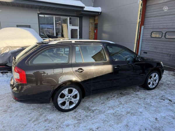 Black Skoda Octavia 2011 in Vilnius, with an engine capacity of 1.20 L and mileage of 313 thousand km for 1950 €, photo 4 on AUTOMOTO.COM.LV