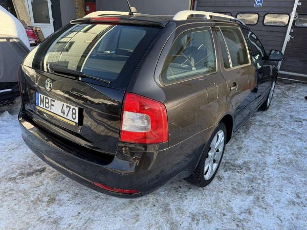 Black Skoda Octavia 2011 in Vilnius, with an engine capacity of 1.20 L and mileage of 313 thousand km for 1950 €, photo 5 on AUTOMOTO.COM.LV
