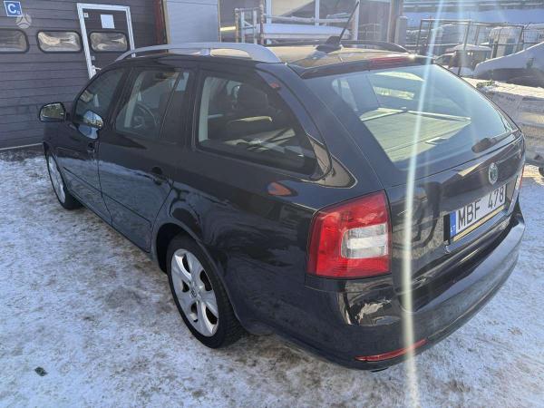 Black Skoda Octavia 2011 in Vilnius, with an engine capacity of 1.20 L and mileage of 313 thousand km for 1950 €, photo 6 on AUTOMOTO.COM.LV