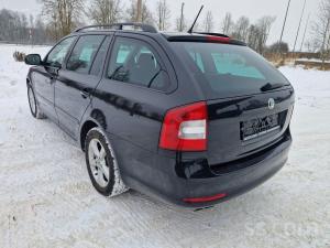 Black Skoda Octavia 2011 in Ogre, with an engine capacity of 1.40 L and mileage of 231 thousand km for 5750 €, photo 4 on AUTOMOTO.COM.LV