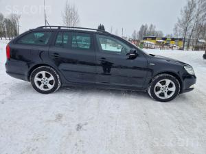 Black Skoda Octavia 2011 in Ogre, with an engine capacity of 1.40 L and mileage of 231 thousand km for 5750 €, photo 5 on AUTOMOTO.COM.LV