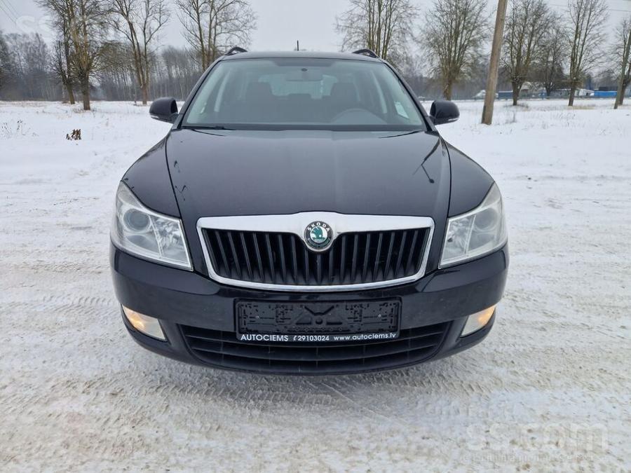 Black Skoda Octavia 2011 in Ogre, with an engine capacity of 1.40 L and mileage of 231 thousand km for 5750 €, photo 6 on AUTOMOTO.COM.LV