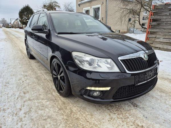 Black Skoda Octavia 2011 in Kaunas, with an engine capacity of 1.97 L and mileage of 280 thousand km for 4950 €, photo 2 on AUTOMOTO.COM.LV