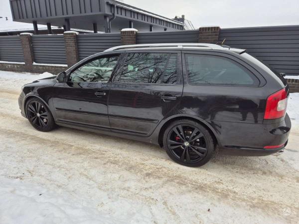Black Skoda Octavia 2011 in Kaunas, with an engine capacity of 1.97 L and mileage of 280 thousand km for 4950 €, photo 3 on AUTOMOTO.COM.LV
