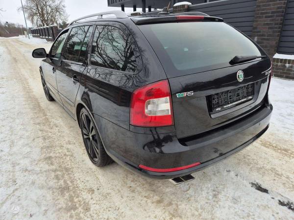 Black Skoda Octavia 2011 in Kaunas, with an engine capacity of 1.97 L and mileage of 280 thousand km for 4950 €, photo 5 on AUTOMOTO.COM.LV
