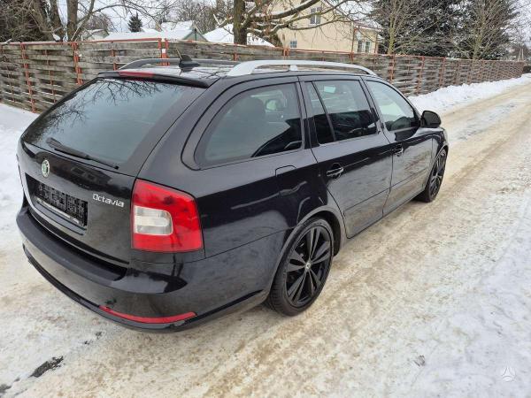 Black Skoda Octavia 2011 in Kaunas, with an engine capacity of 1.97 L and mileage of 280 thousand km for 4950 €, photo 6 on AUTOMOTO.COM.LV