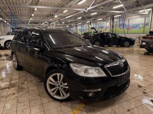 Black Skoda Octavia 2011 in Vilnius, with an engine capacity of 1.97 L and mileage of 380 thousand km for 3900 €, photo 2 on AUTOMOTO.COM.LV