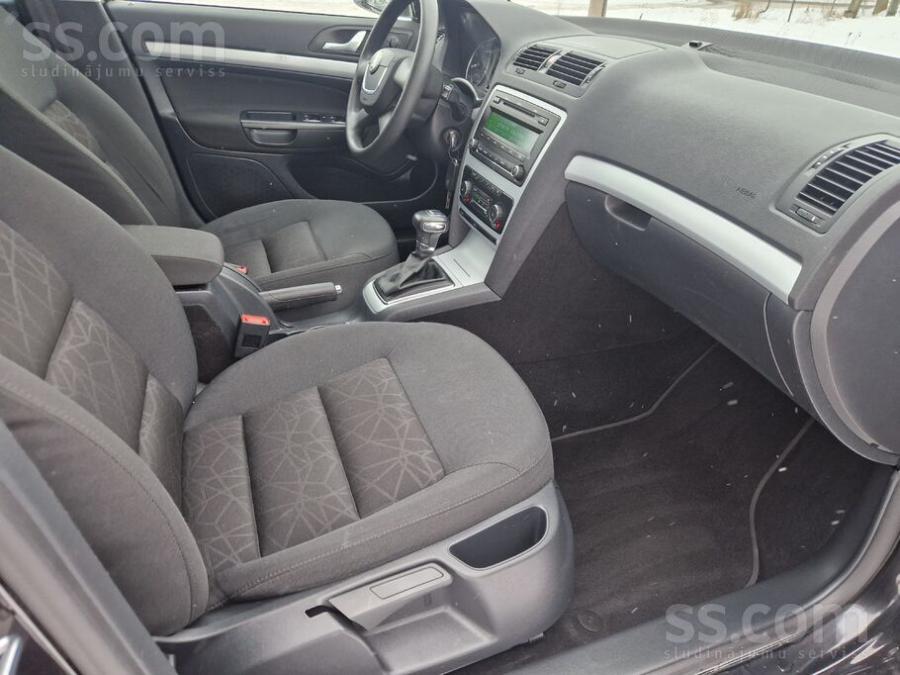 Melns Skoda Octavia 2011 Ogre, ar dzinēja tilpumu 1.40 L un nobraukumu 231 tūkst. km par 5750 €, foto 11 vietnē AUTOMOTO.COM.LV