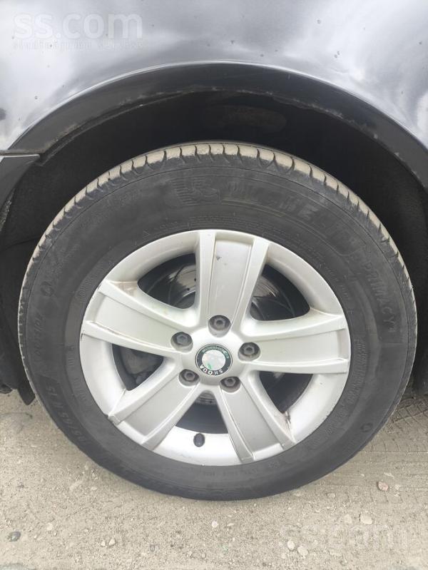 Melns Skoda Octavia 2011 Rīga, ar dzinēja tilpumu 1.60 L un nobraukumu 325 tūkst. km par 2050 €, foto 7 vietnē AUTOMOTO.COM.LV