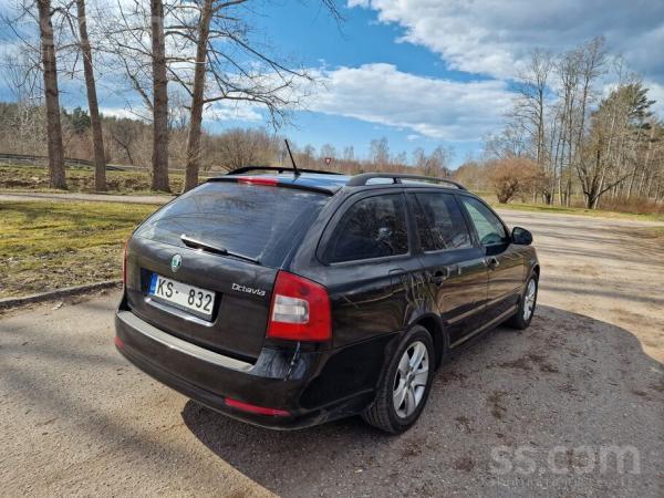 Black Skoda Octavia 2011 in Ventspils, with an engine capacity of 2.00 L and mileage of 271 thousand km for 4790 €, photo 6 on AUTOMOTO.COM.LV