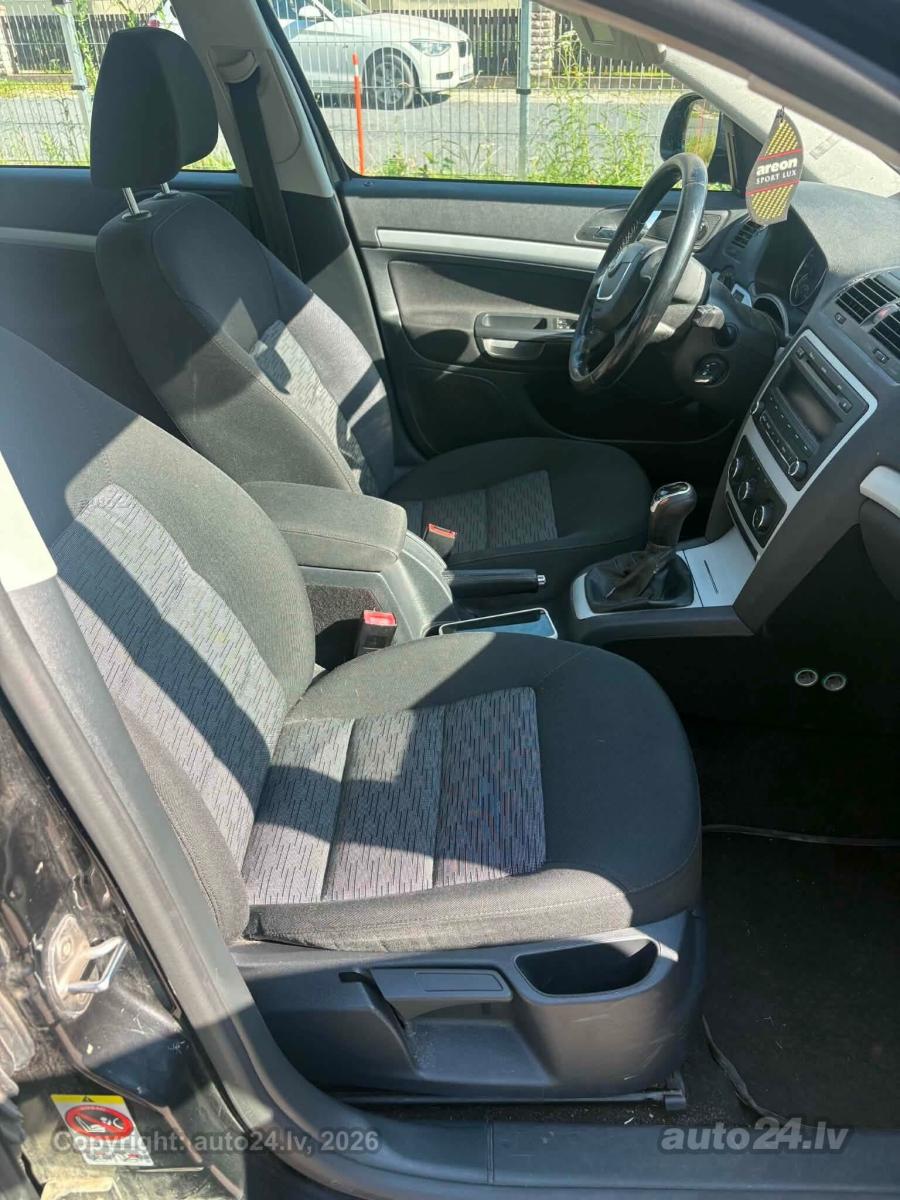 Black Skoda Octavia 2011 in Tallinn, with an engine capacity of 2.00 L and mileage of 360 thousand km for 3500 €, photo 13 on AUTOMOTO.COM.LV