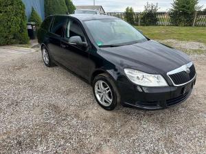 Black Skoda Octavia 2011 in Jurbarkas, with an engine capacity of 1.60 L and mileage of 268 thousand km for 3599 €, photo  on AUTOMOTO.COM.LV