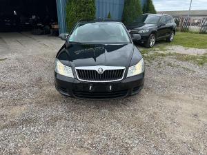 Black Skoda Octavia 2011 in Jurbarkas, with an engine capacity of 1.60 L and mileage of 268 thousand km for 3599 €, photo 4 on AUTOMOTO.COM.LV