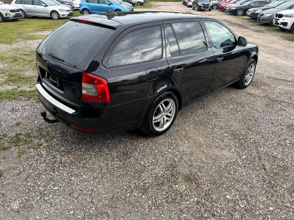 Black Skoda Octavia 2011 in Jurbarkas, with an engine capacity of 1.60 L and mileage of 268 thousand km for 3599 €, photo 6 on AUTOMOTO.COM.LV