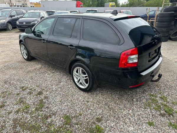 Black Skoda Octavia 2011 in Jurbarkas, with an engine capacity of 1.60 L and mileage of 268 thousand km for 3599 €, photo 8 on AUTOMOTO.COM.LV