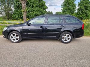 Black Skoda Octavia 2011 in Ogre, with an engine capacity of 1.40 L and mileage of 231 thousand km for 5650 €, photo 6 on AUTOMOTO.COM.LV