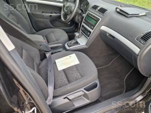 Black Skoda Octavia 2011 in Ogre, with an engine capacity of 1.40 L and mileage of 231 thousand km for 5650 €, photo 14 on AUTOMOTO.COM.LV