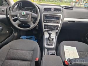 Black Skoda Octavia 2011 in Ogre, with an engine capacity of 1.40 L and mileage of 231 thousand km for 5650 €, photo 15 on AUTOMOTO.COM.LV