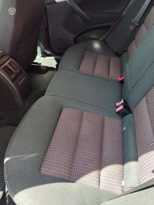 Black Skoda Octavia 2011 in Alytus, with an engine capacity of 1.97 L and mileage of 298 thousand km for 4600 €, photo 12 on AUTOMOTO.COM.LV