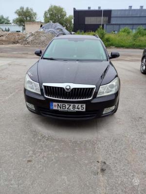 Black Skoda Octavia 2011 in Alytus, with an engine capacity of 1.97 L and mileage of 298 thousand km for 4600 €, photo 15 on AUTOMOTO.COM.LV