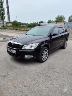 Black Skoda Octavia 2011 in Alytus, with an engine capacity of 1.97 L and mileage of 298 thousand km for 4600 €, photo 16 on AUTOMOTO.COM.LV