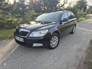 Black Skoda Octavia 2011 in Kaunas, with an engine capacity of 1.97 L and mileage of 299 thousand km for 3650 €, photo  on AUTOMOTO.COM.LV